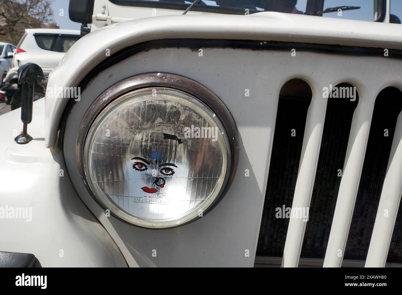 Jaipur, India: Artistically painted headlights on off-road vehicles ...