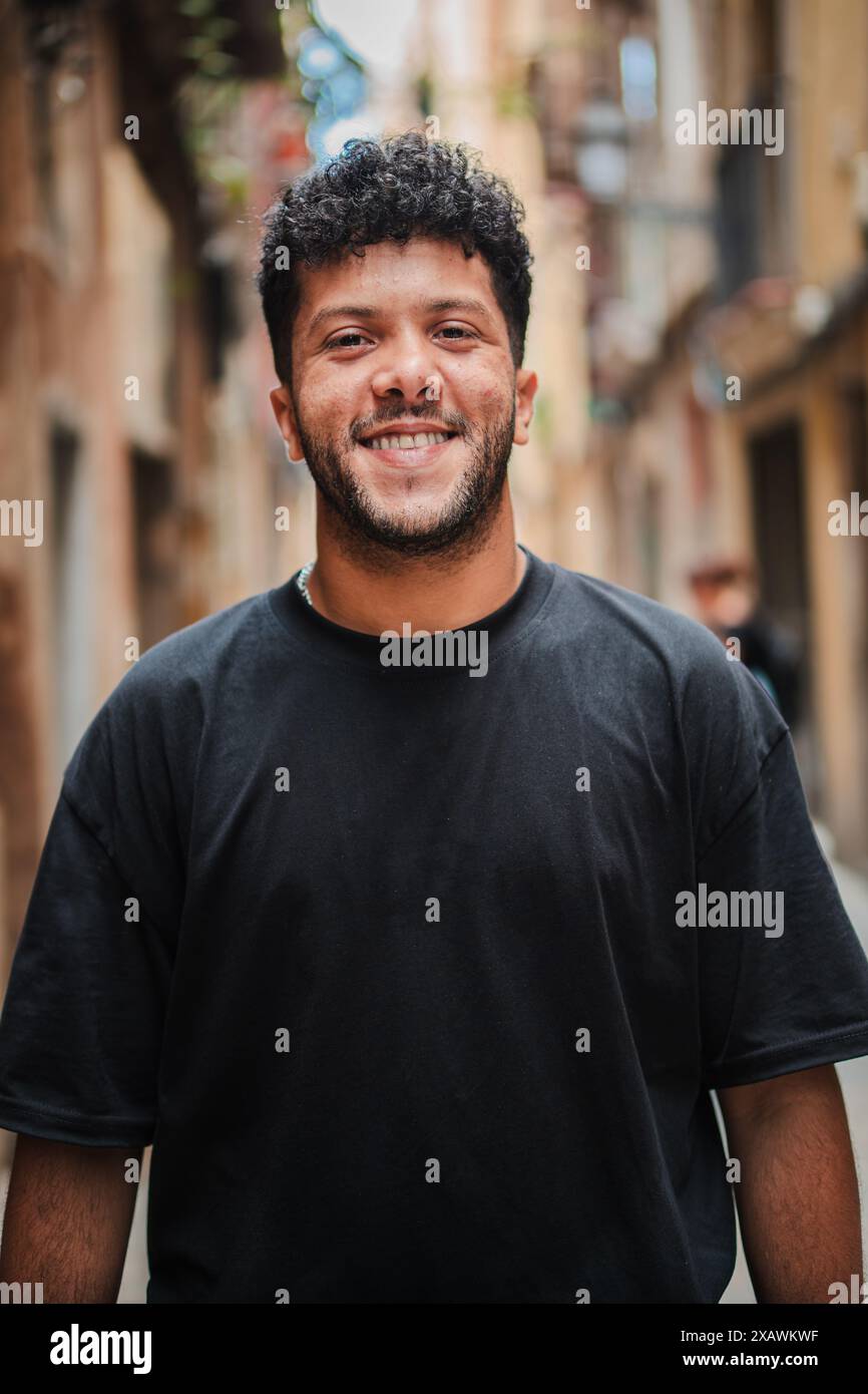 Vertical individual portrait of one arab male smiling and looking at ...