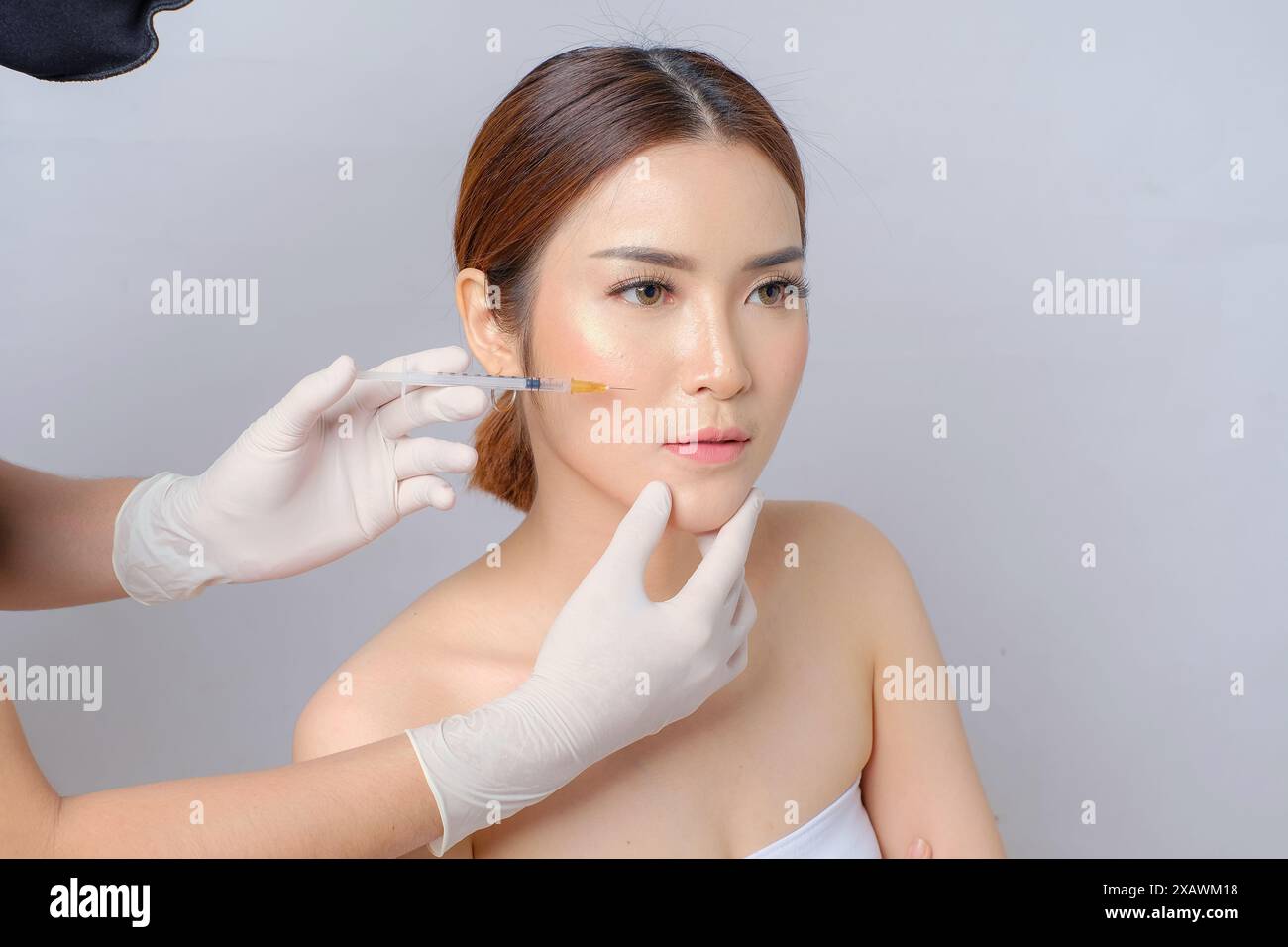 Revitalize Asian Beauty Botox for Youthful Glow Stock Photo - Alamy
