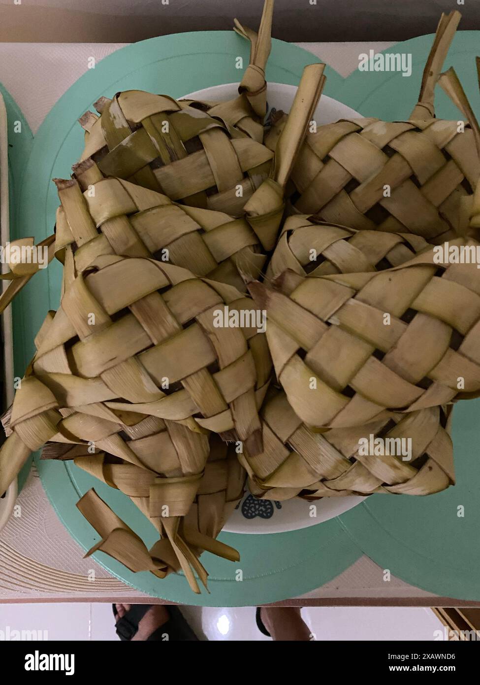 Photo of puso , tamu, also known in Philippine English as hanging rice ...