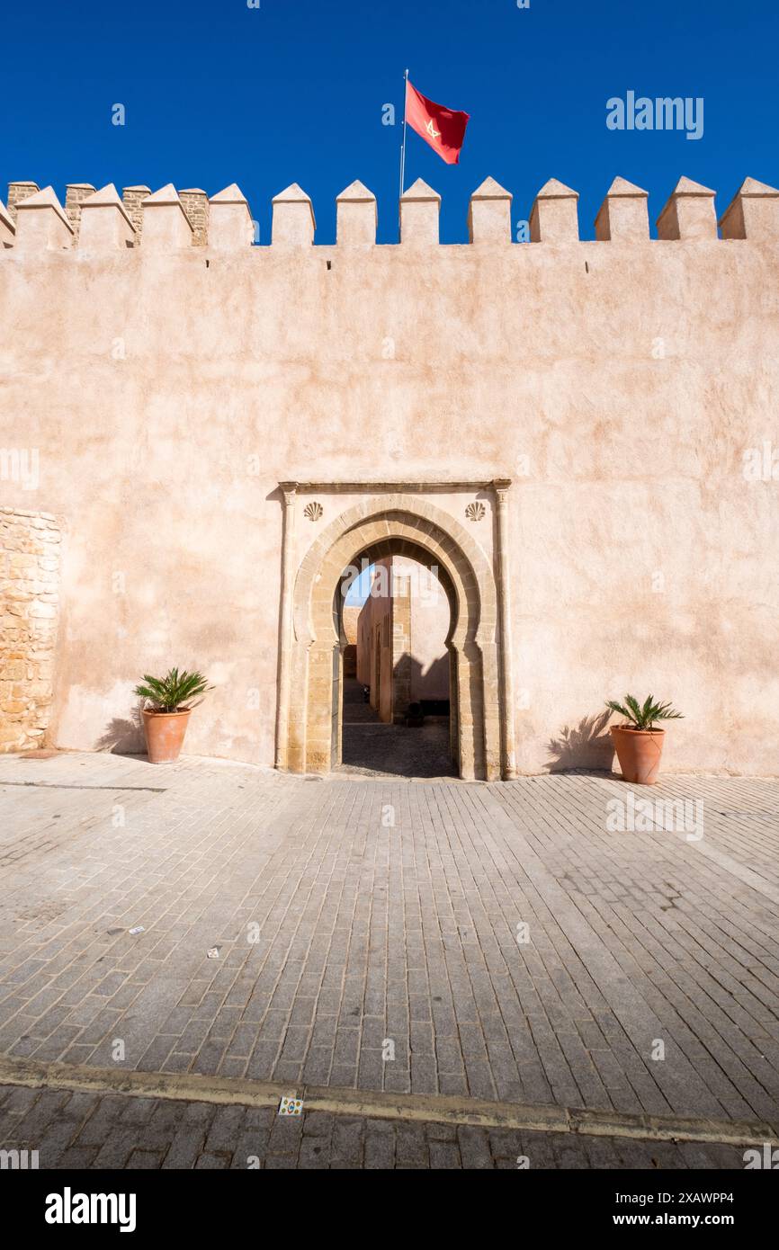 Typical door with Arabic pointed arch on the walls of the Kasbah of the ...