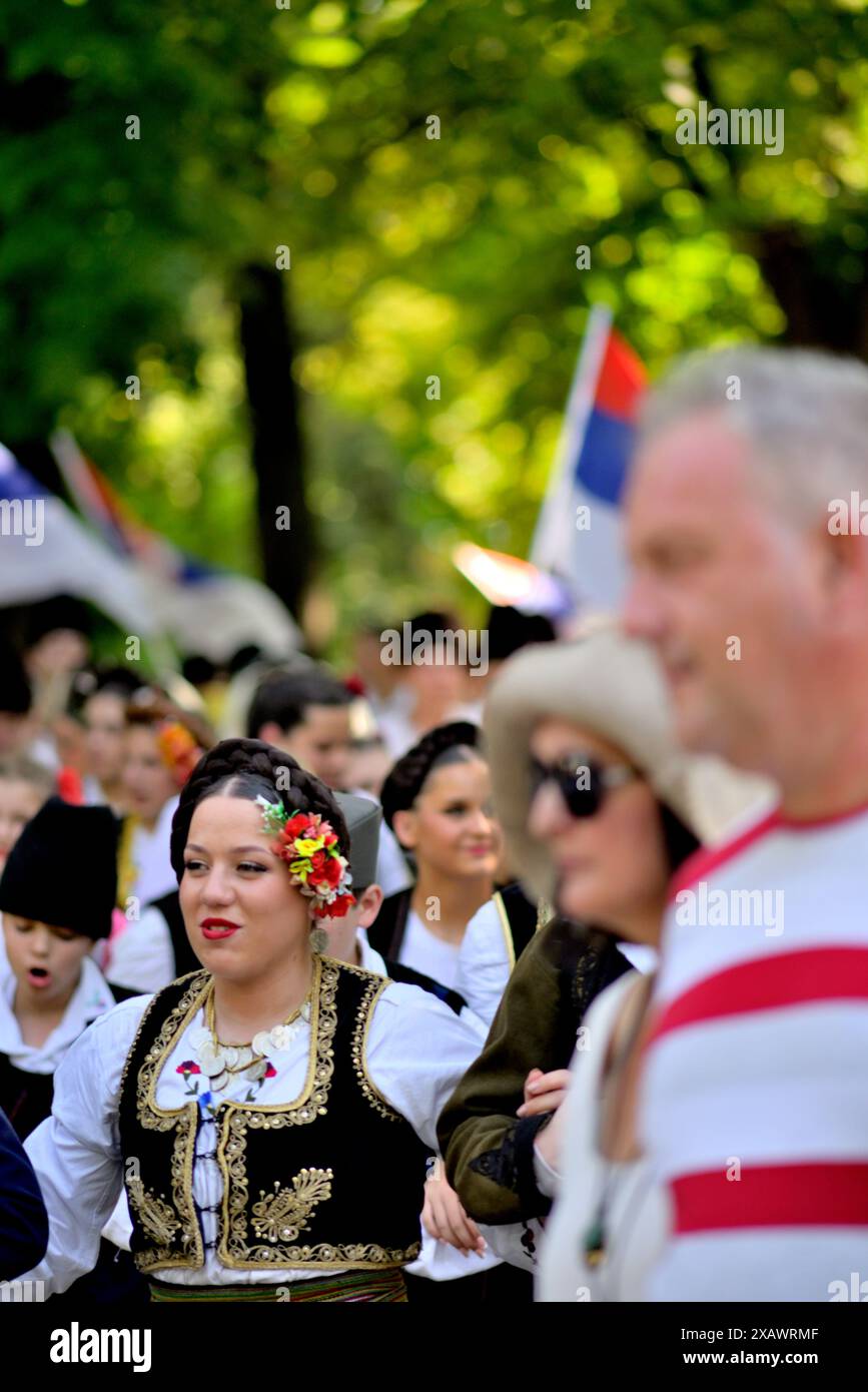 Young people wearing folklore costumes during the All-Serb Assembly ...