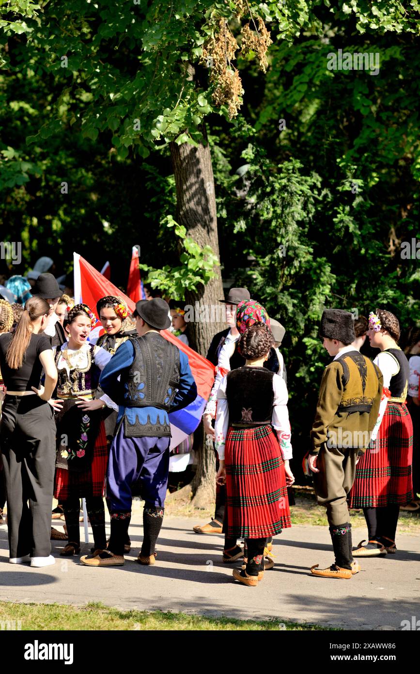 Young people wearing folklore costumes during the All-Serb Assembly ...
