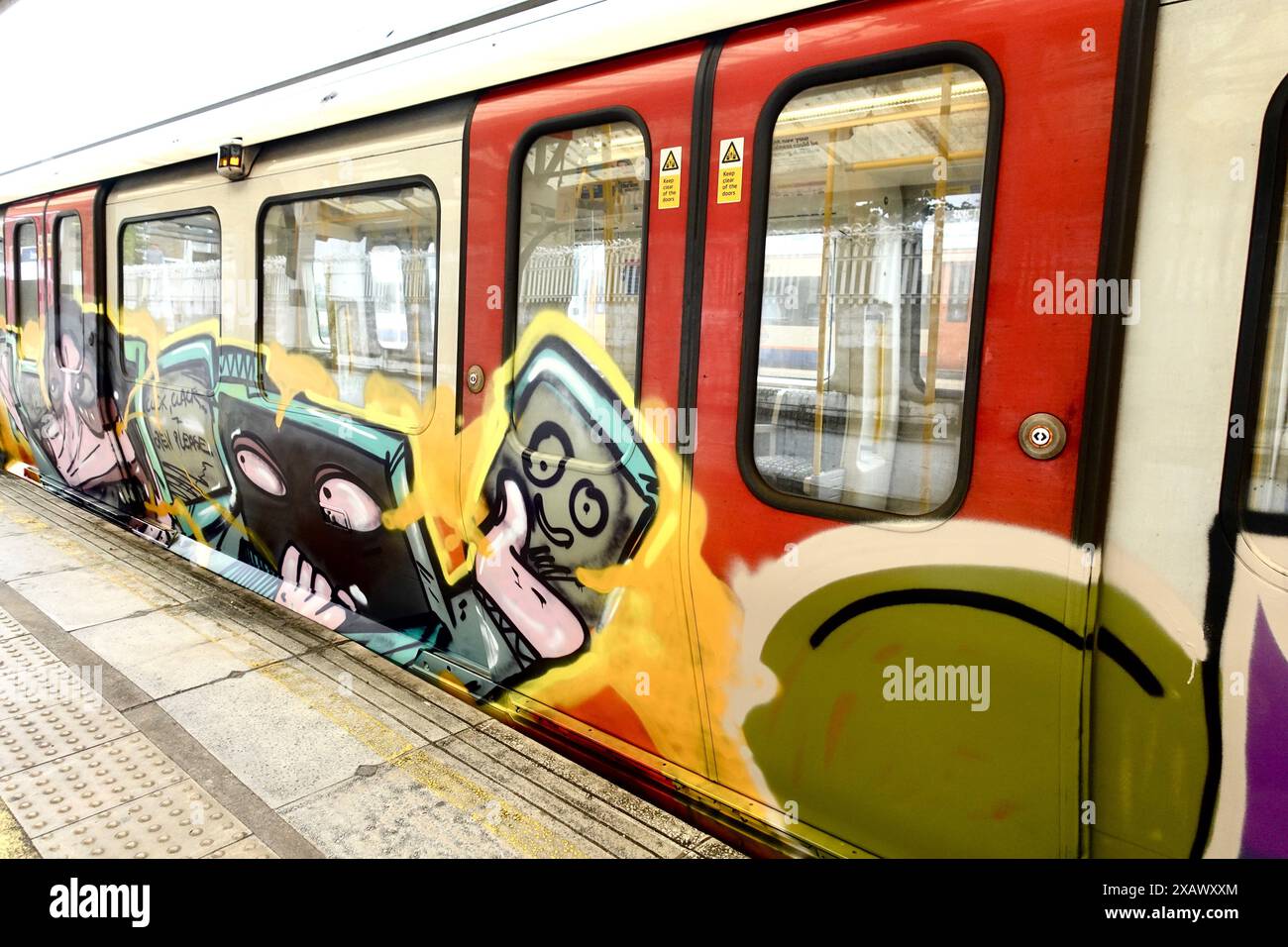It's like the 1980s again - graffiti art on the London Underground tube ...