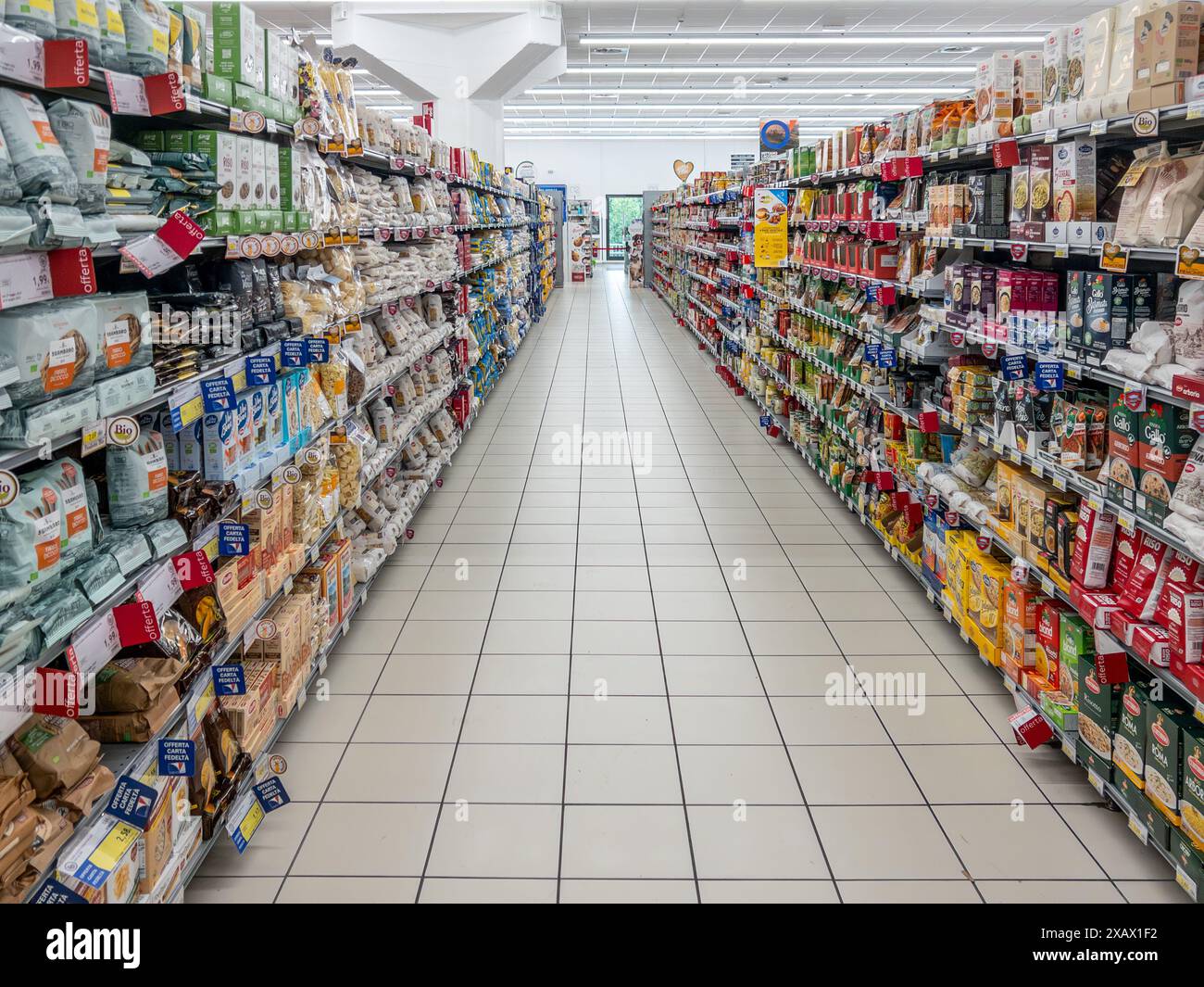 Italy - June 09, 2024: Aisle with shelves with pasta and rice products ...
