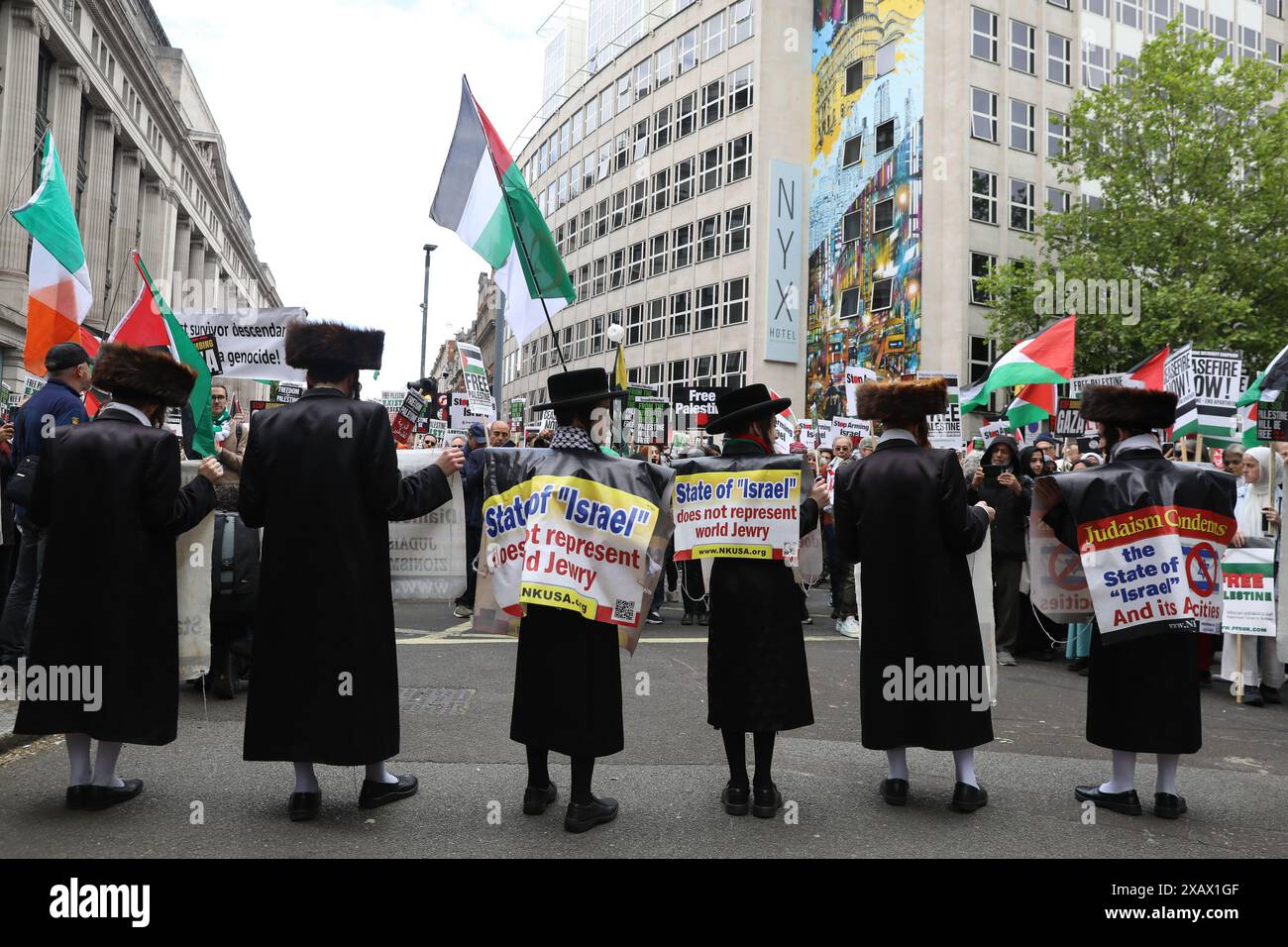 Anti-Zionist Jews hold signs against the state of Israel during the Pro ...
