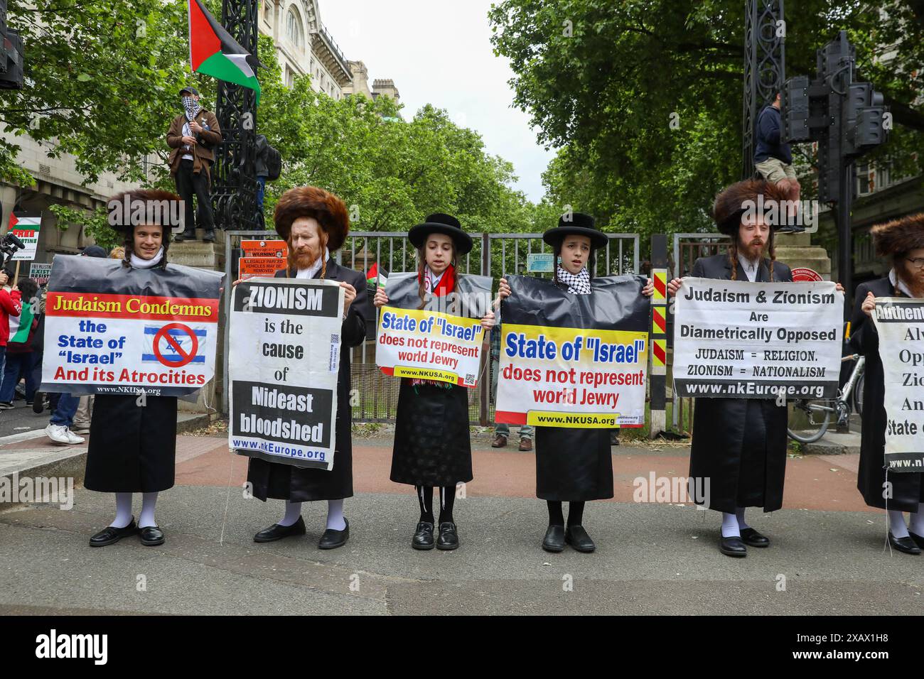 Anti-Zionist Jews hold signs against the state of Israel during the Pro ...