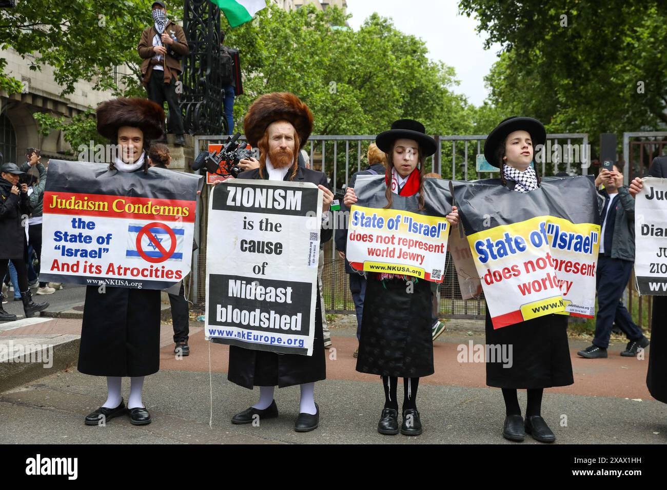 Anti-Zionist Jews hold signs against the state of Israel during the Pro ...