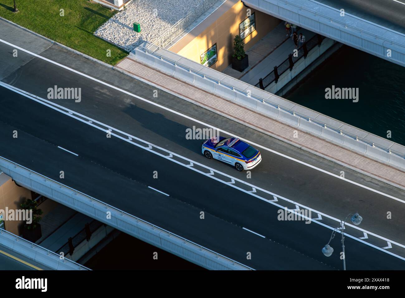 Qatar Traffic Police vehicle in Pearl Qatar road patrolling Stock Photo ...