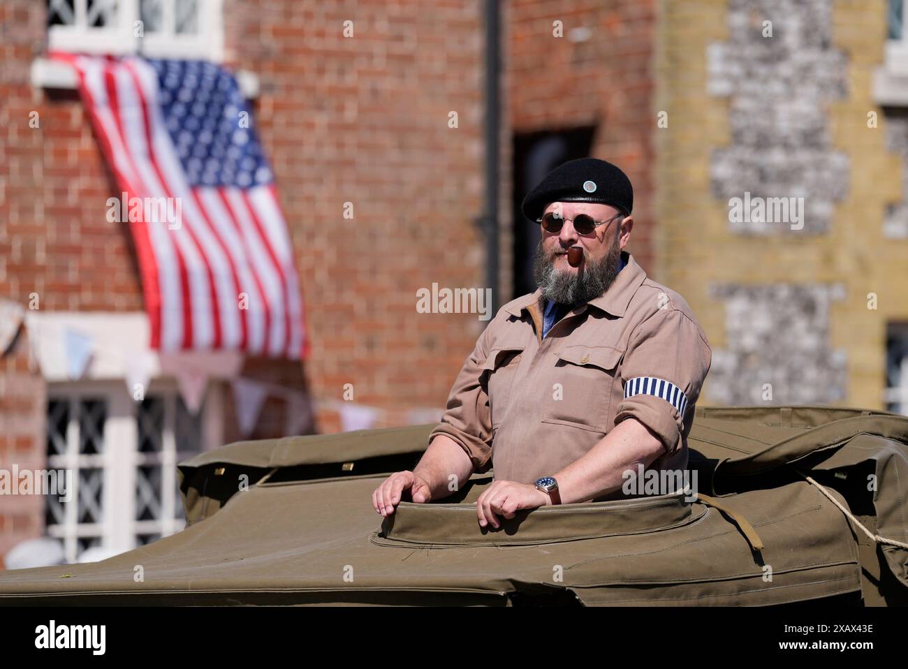 A Southwick Revival enthusiast takes part in a military vehicle ...