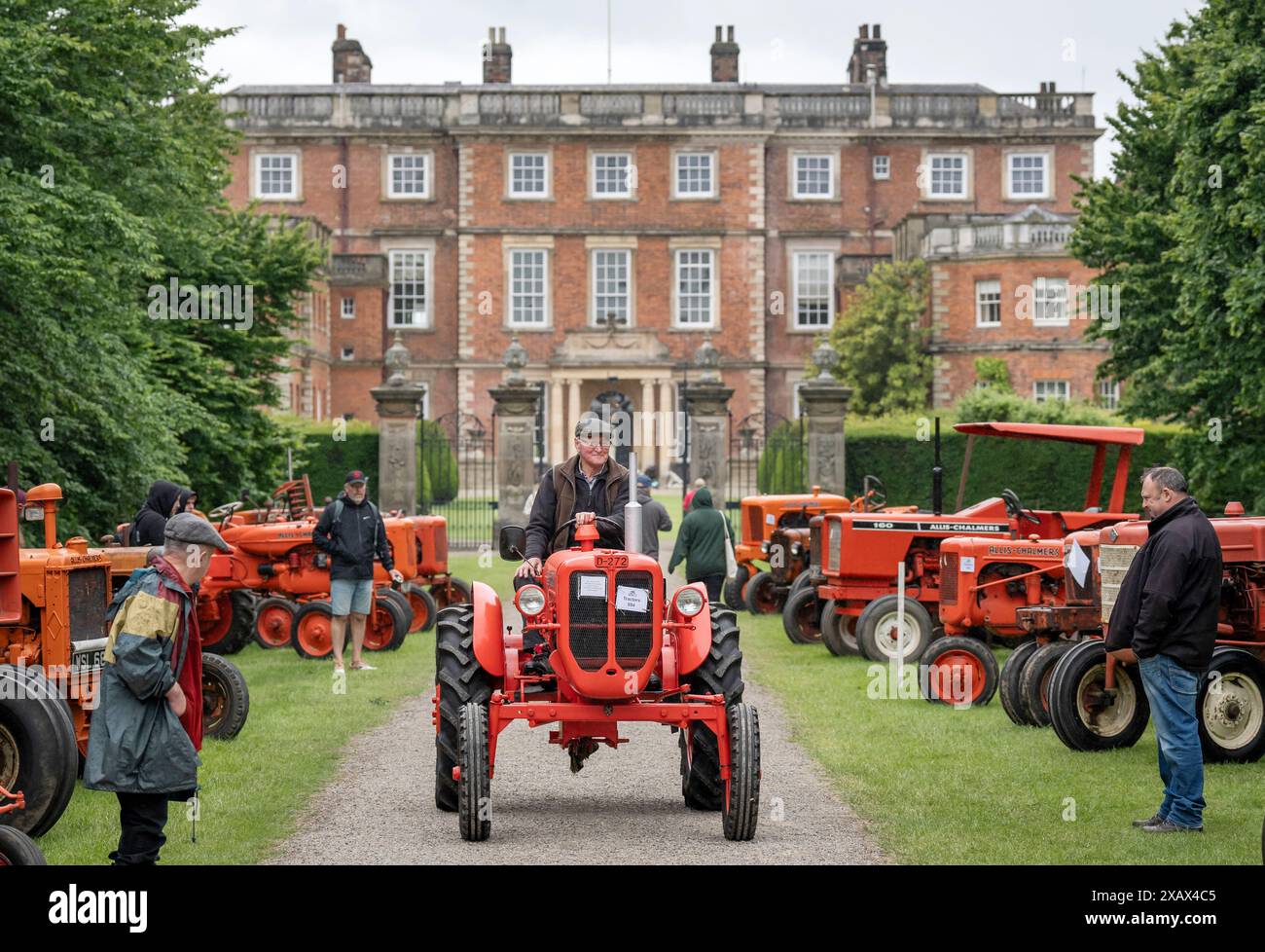 A man drives an Allis-Chalmers D-272 tractor at Tractor Fest in Newby ...