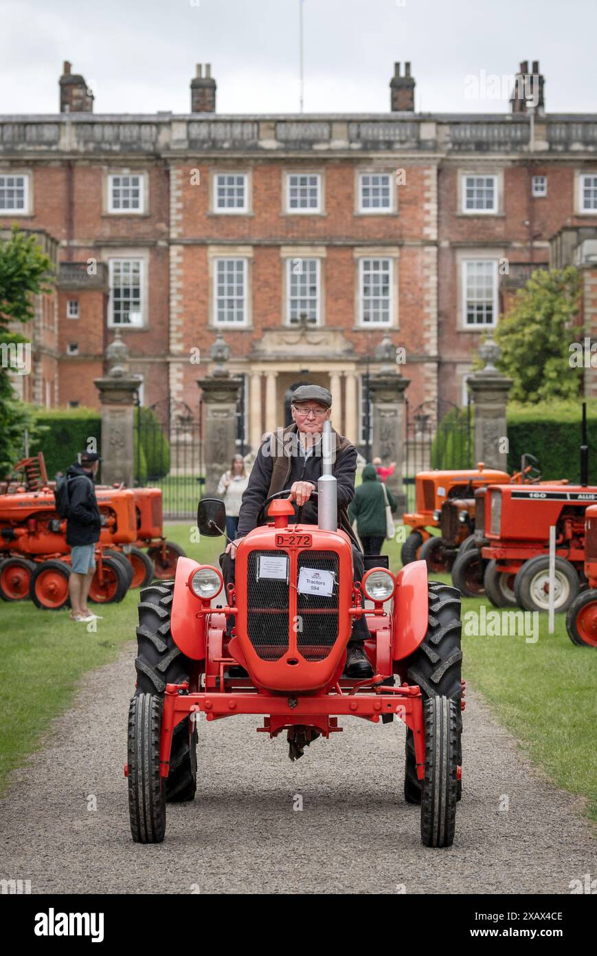 A man drives an Allis-Chalmers D-272 tractor at Tractor Fest in Newby ...