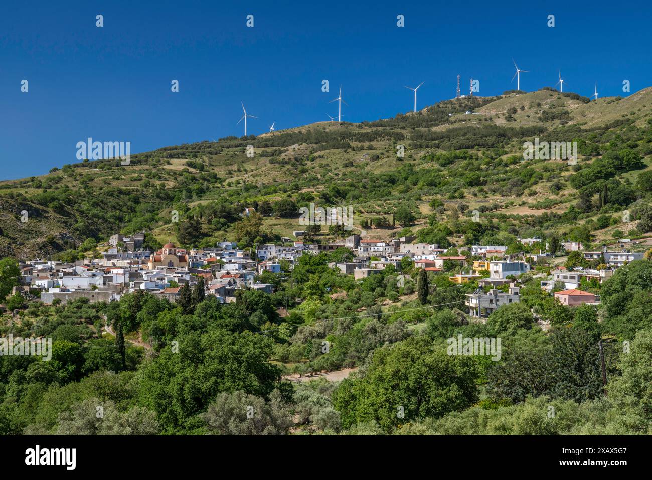 General view of village of Prinias, wind generators in distance ...