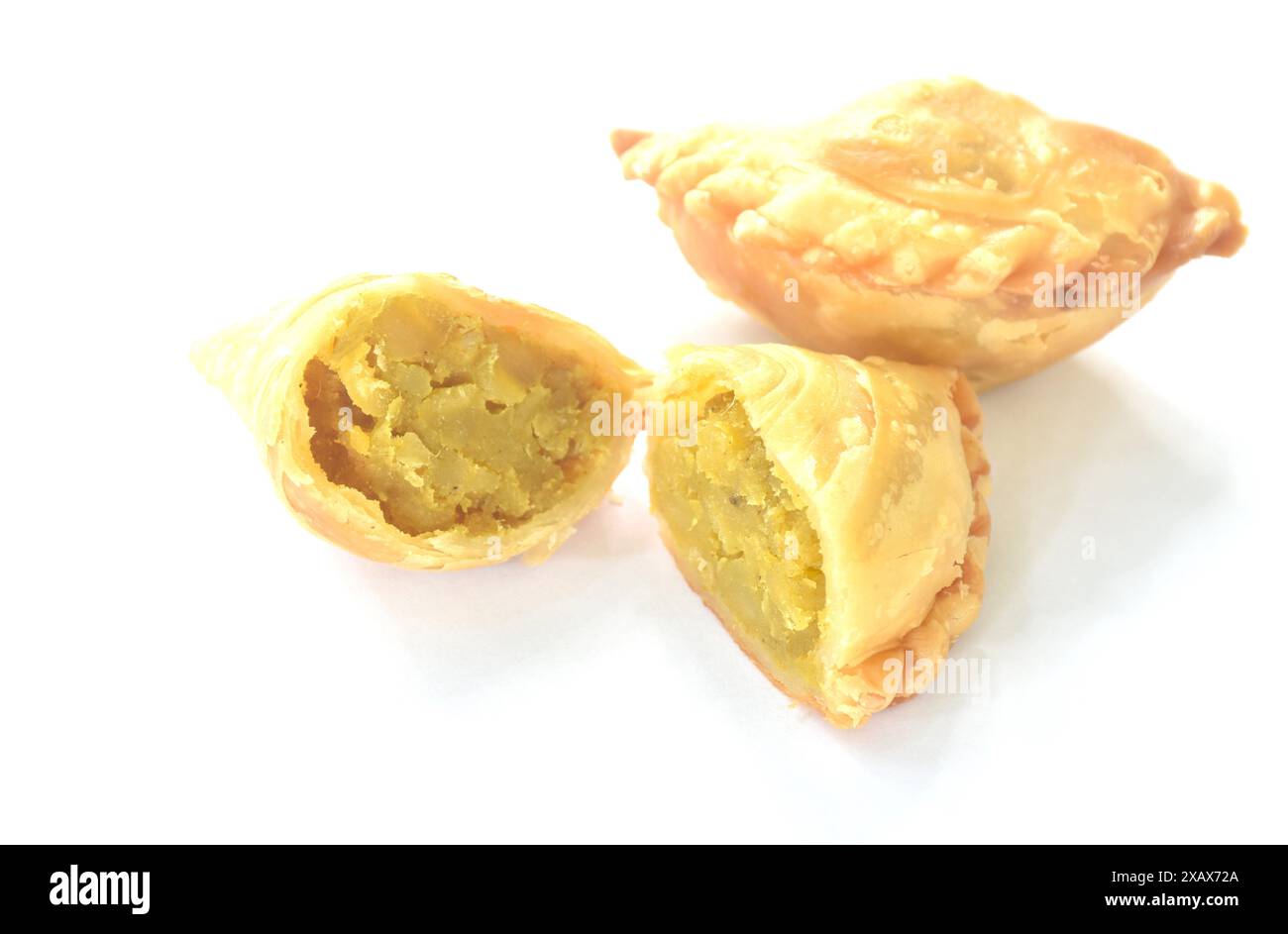 mini chicken filled curry puff arranging on white background Stock ...