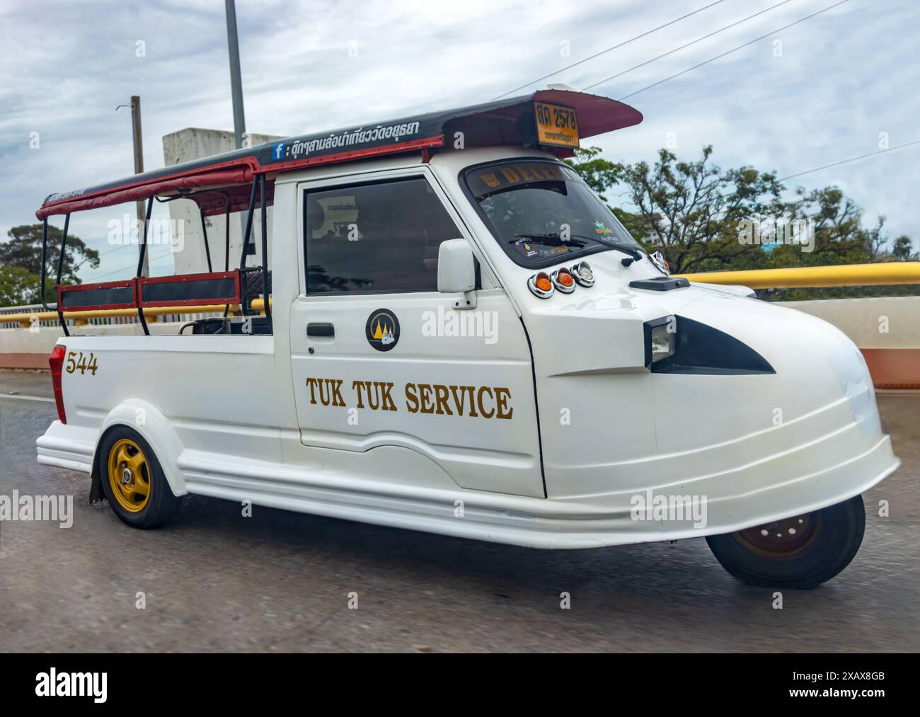 AYUTTHAYA, THAILAND, JUNE 03 2024, A traditional taxi tricycle (tuk tuk ...