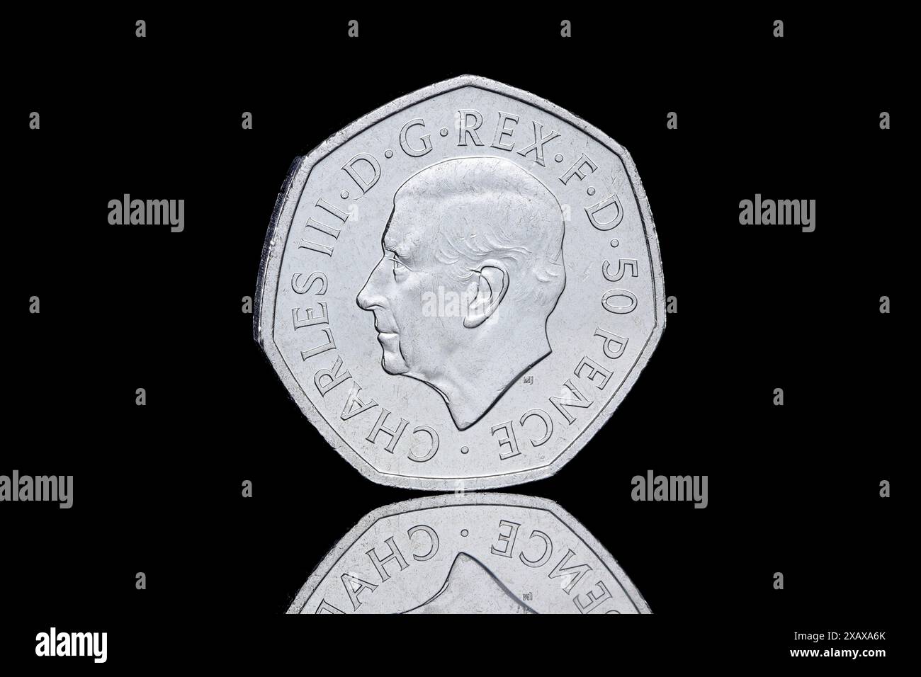 A 2022 50p coin which was the first coin to feature King Charles III ...