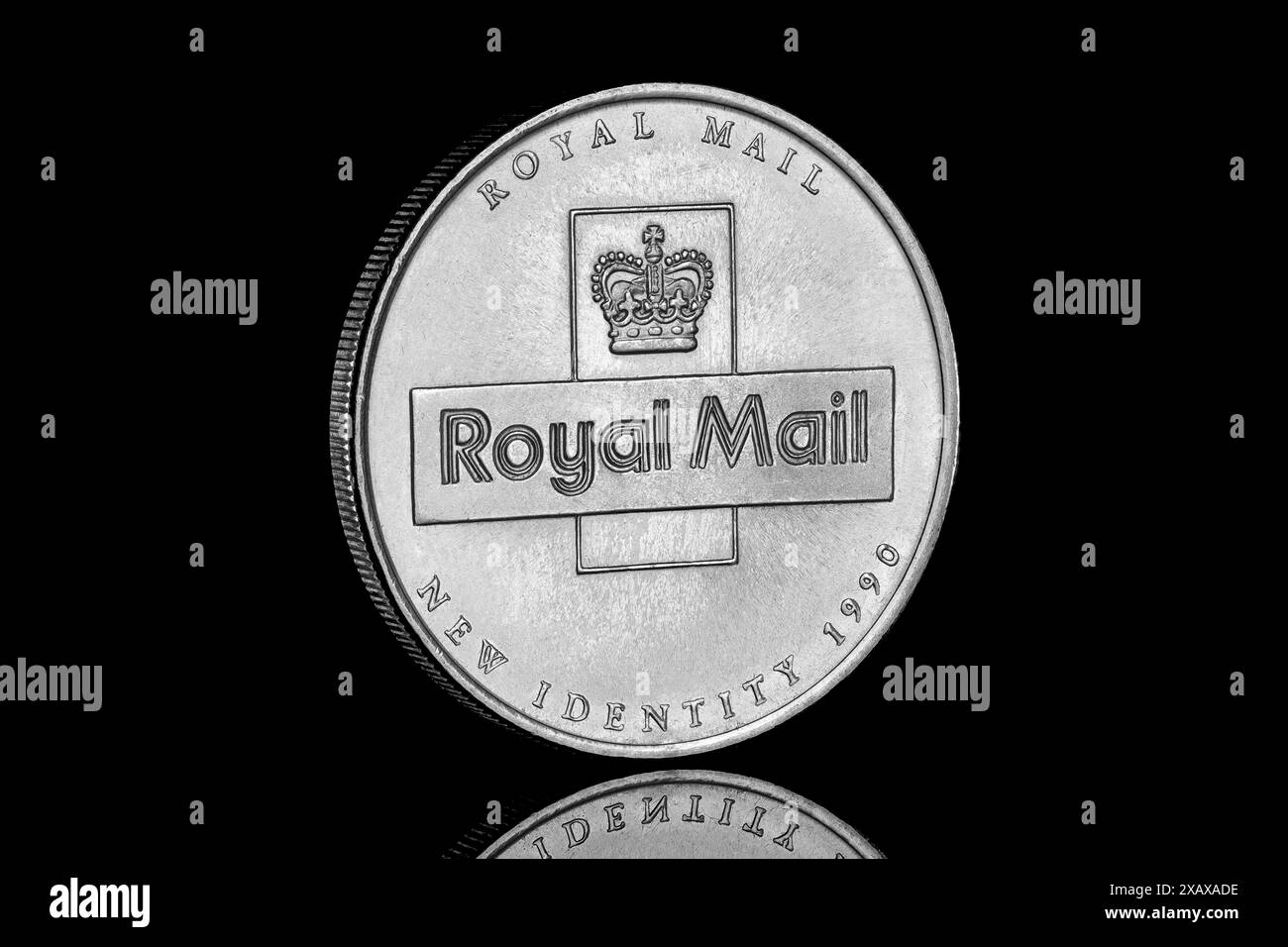 A coin issued to staff, to commemorate the company's New Identity of ...