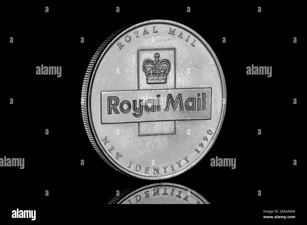 A coin issued to staff, to commemorate the company's New Identity of ...