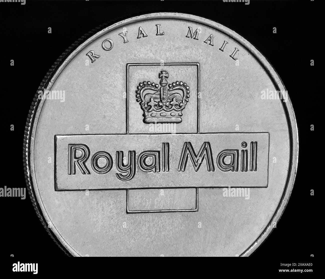 A coin issued to staff, to commemorate the company's New Identity of ...