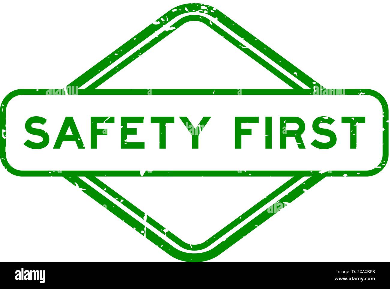 Grunge green safety first word rubber seal stamp on white background ...