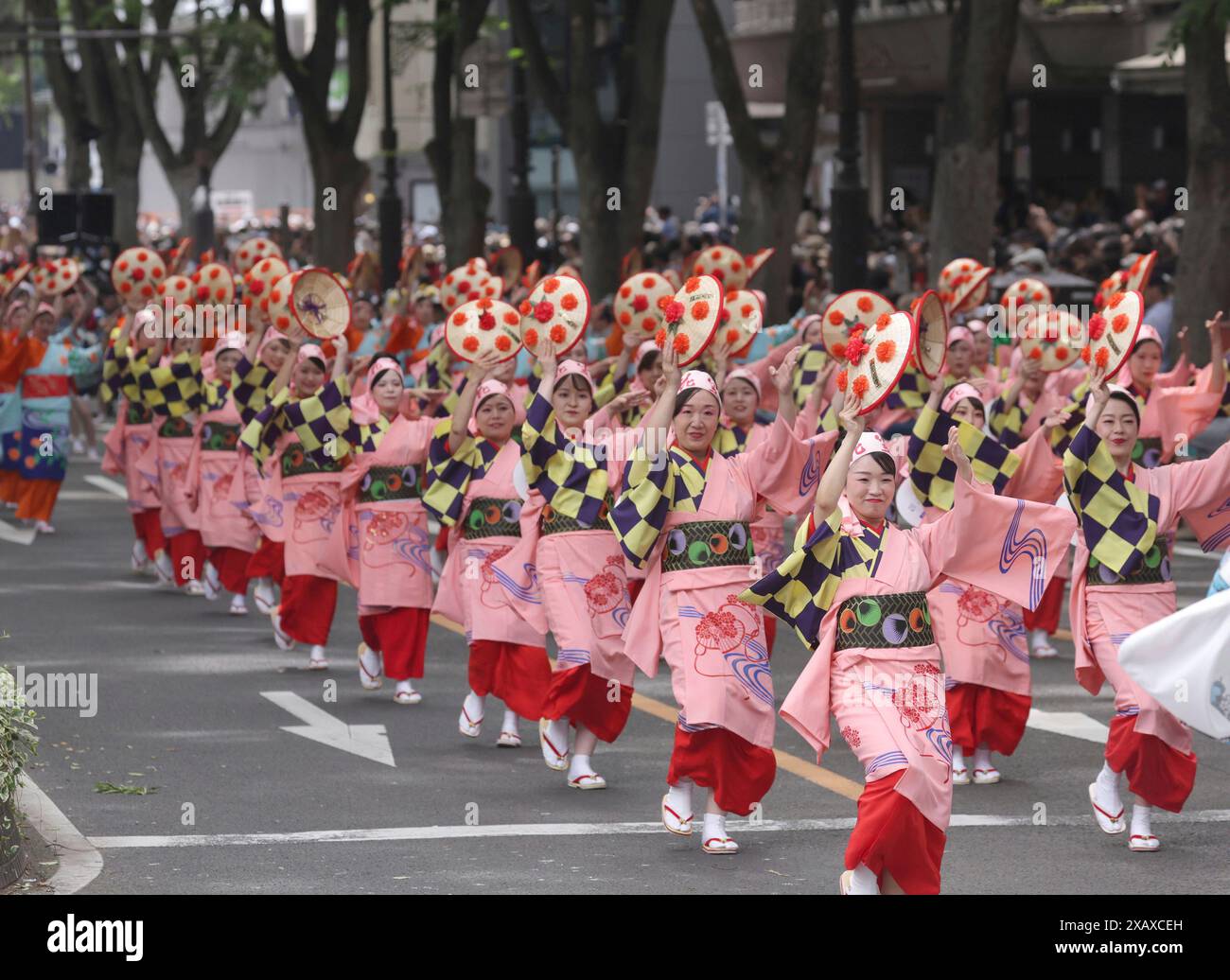 Yamagata Hanagasa , dancers waving hats adorned with orange safflowers ...