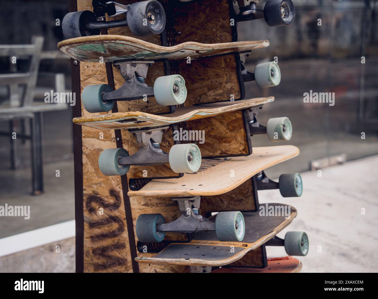 A stack of skateboards on a special outdoor stand Stock Photo - Alamy