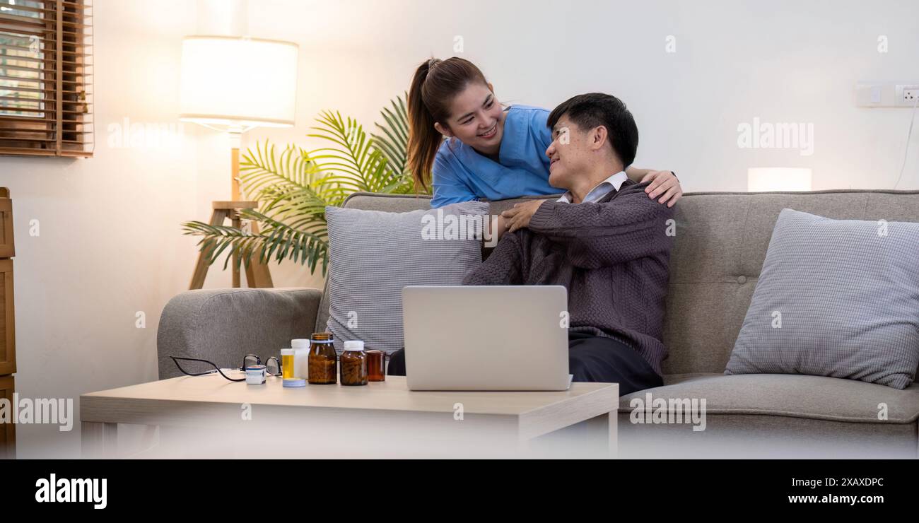 Caring Nurse Assisting Elderly Man with Medication at Home ...