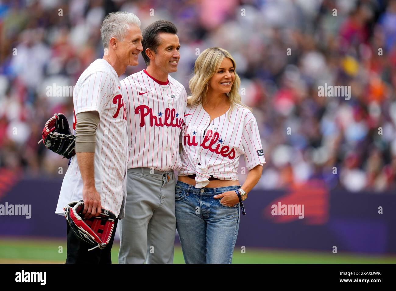 Former Philadelphia Phillies player Chase Utley, left, poses for a ...