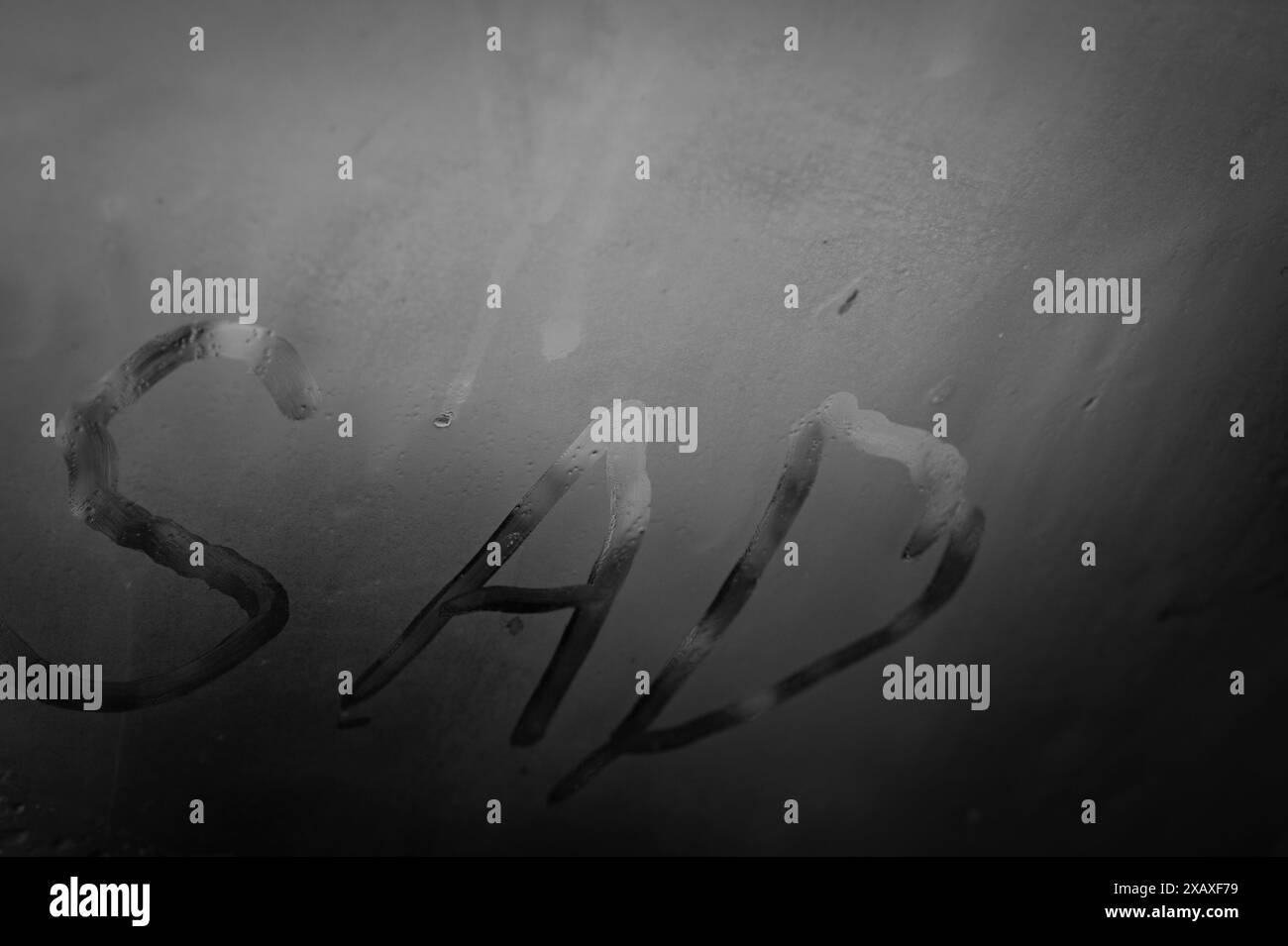 Word sad written on foggy window with rain drops Stock Photo - Alamy