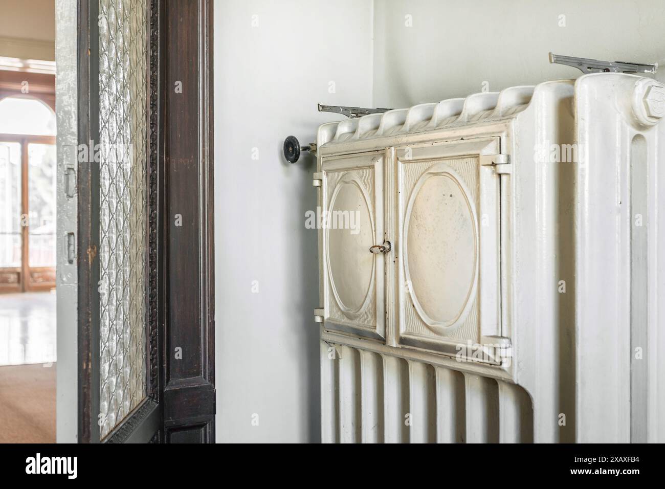 Antique cast iron radiator (1900s Italian) with food warmer Stock Photo ...