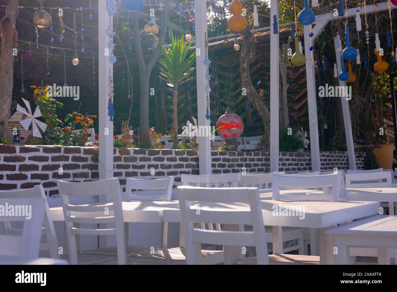 beautiful Turkish style restaurant with white tables and colorful ...