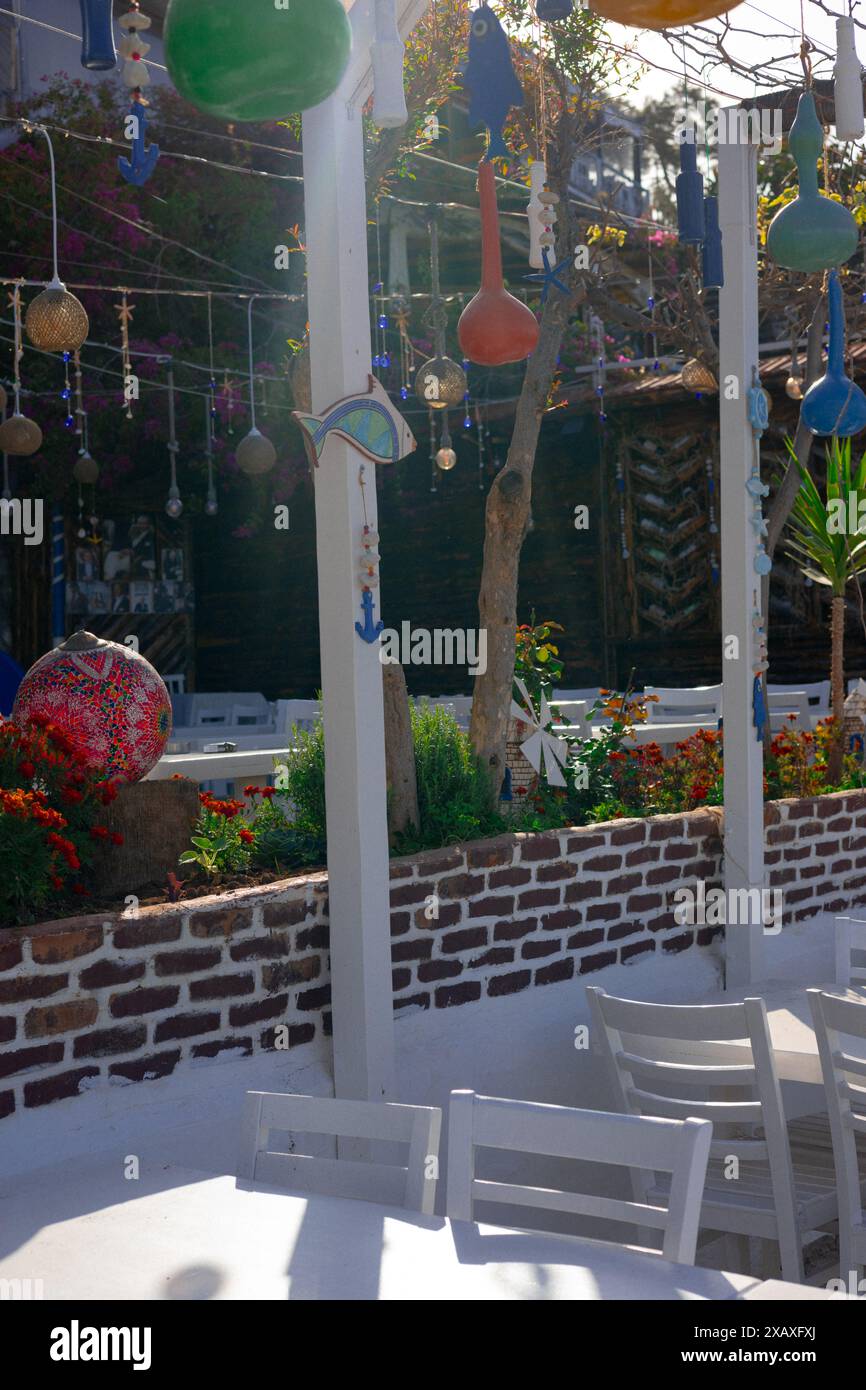 beautiful Turkish style restaurant with white tables and colorful ...