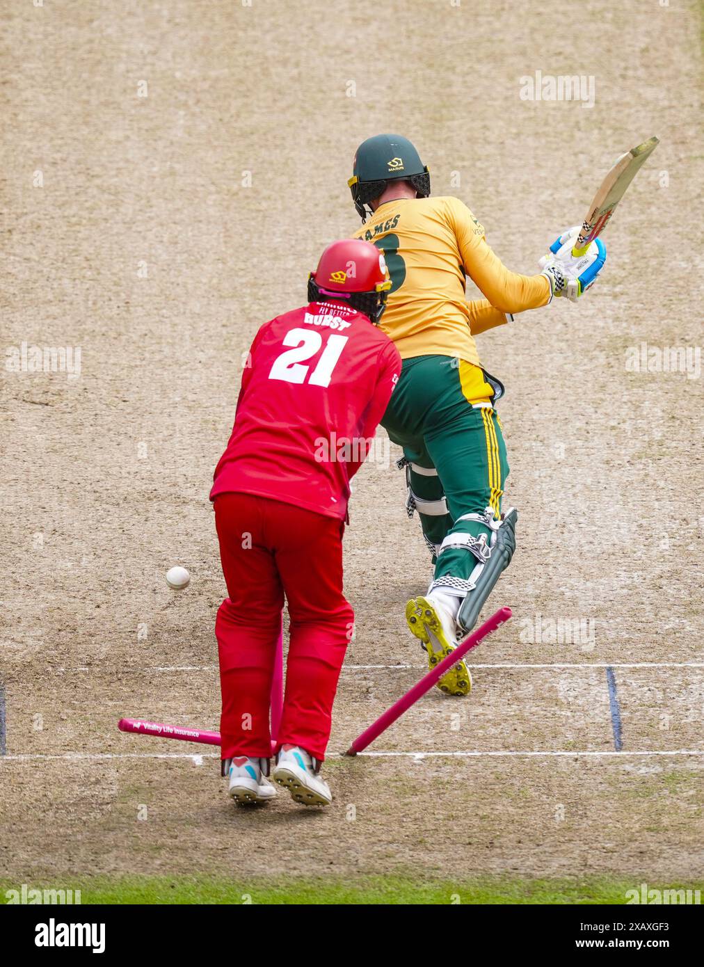 Nottinghamshire's Lyndon James is bowled by Lancashire's Chris Green ...