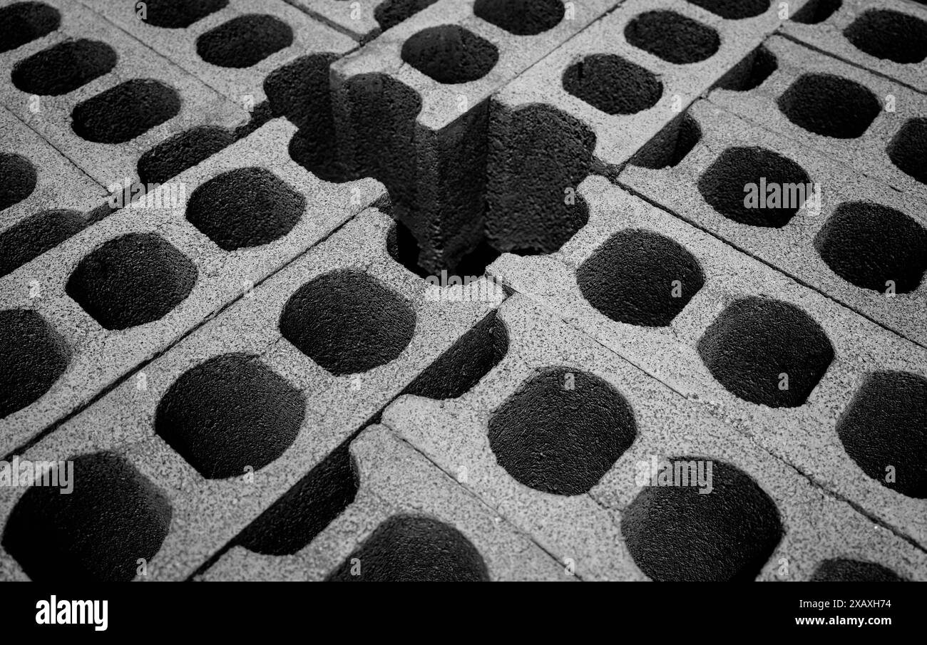 Concrete blocks with holes stacked on top of each other Stock Photo - Alamy