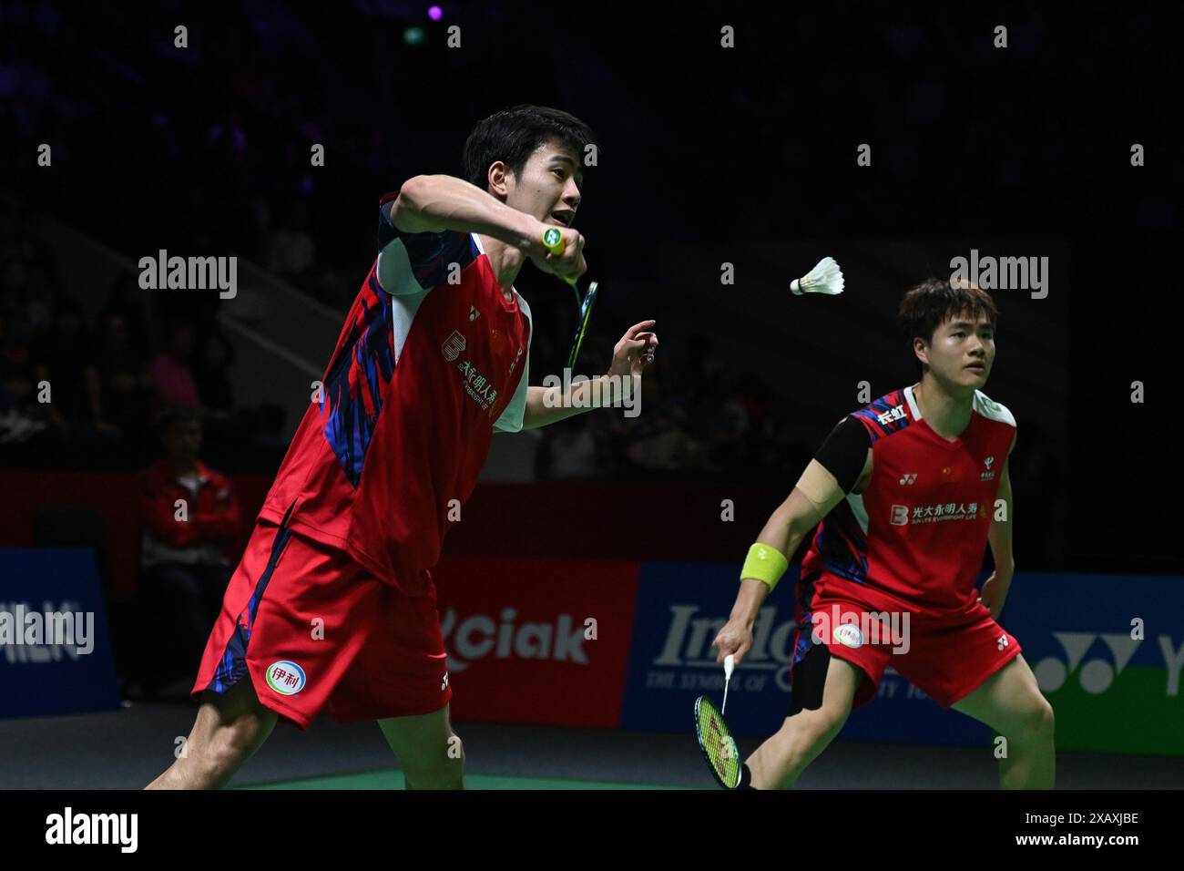 Jakarta, Indonesia. 9th June, 2024. Liang Weikeng (R)/Wang Chang compete during the men's ...