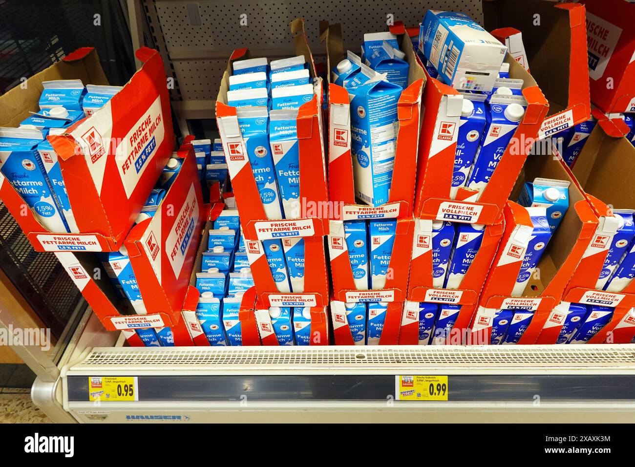 Milk cartons in cardboard boxes in a Grocery Stock Photo - Alamy