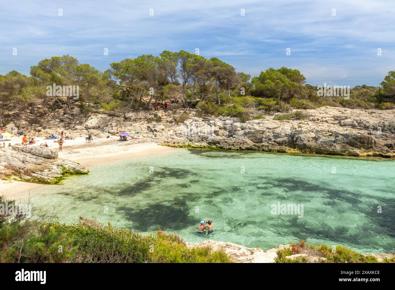 View of Talaier beach, beautiful azure water, people sunbathing, yachts ...