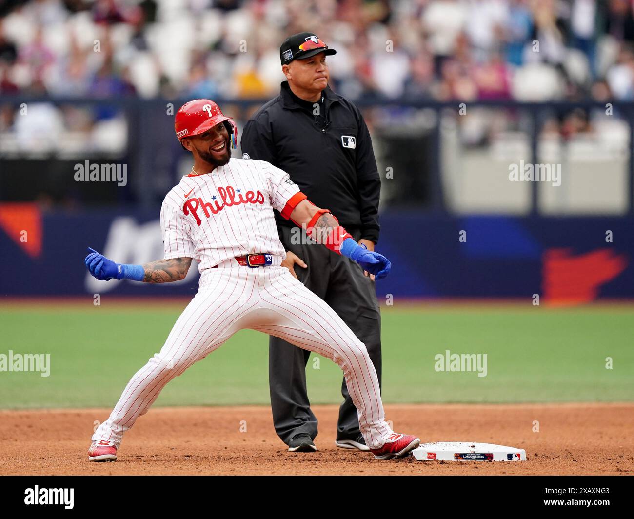 Philadelphia Phillies' Edmundo Sosa (left) celebrates after being ...