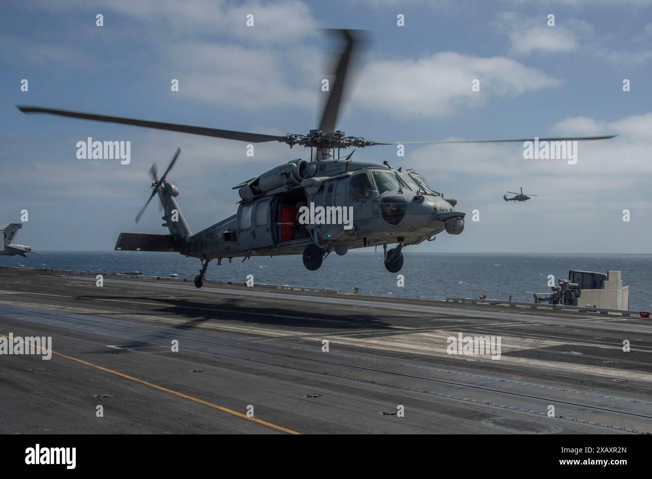 240524-N-IJ966-2059 PACIFIC OCEAN (May 24, 2024) An MH-60S Sea Hawk ...