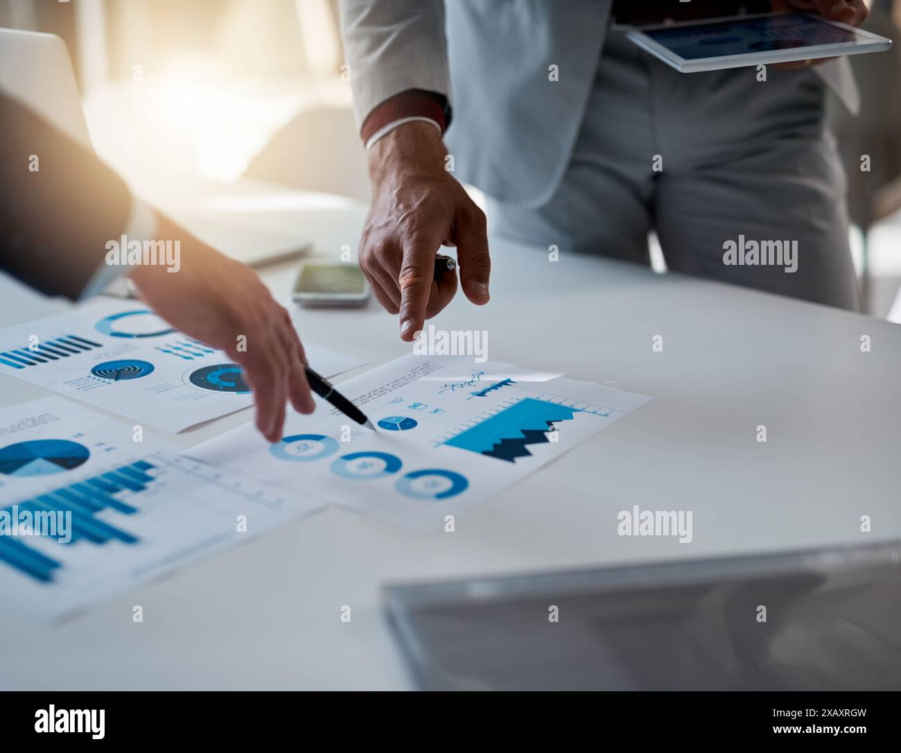Charts, graphs and hands of business people in office with paperwork ...