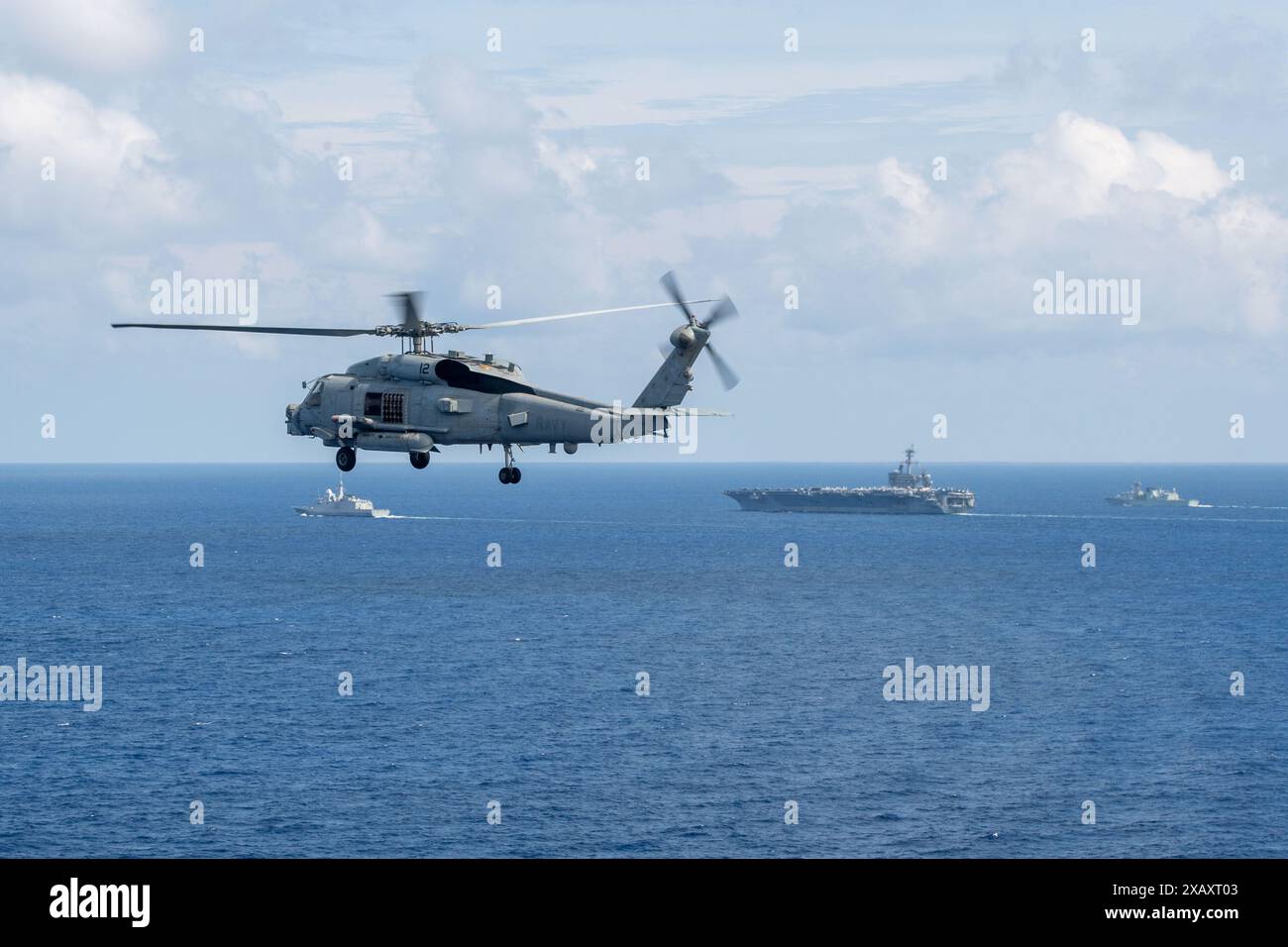 SOUTH CHINA SEA (June 7, 2024) An MH-60R Sea Hawk, assigned to the ...