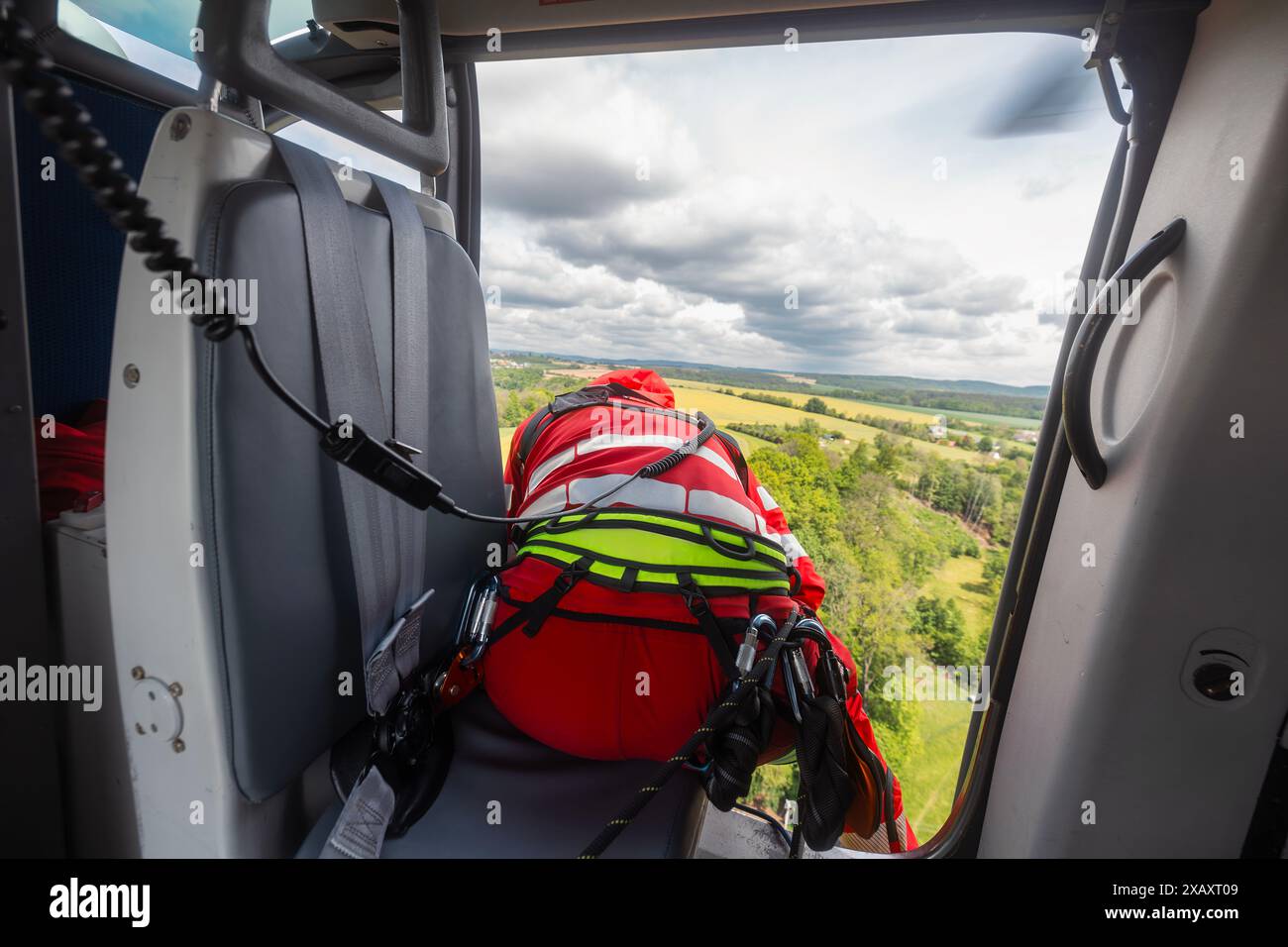 Rescue in difficult to access terrain. Paramedic of Helicopter ...