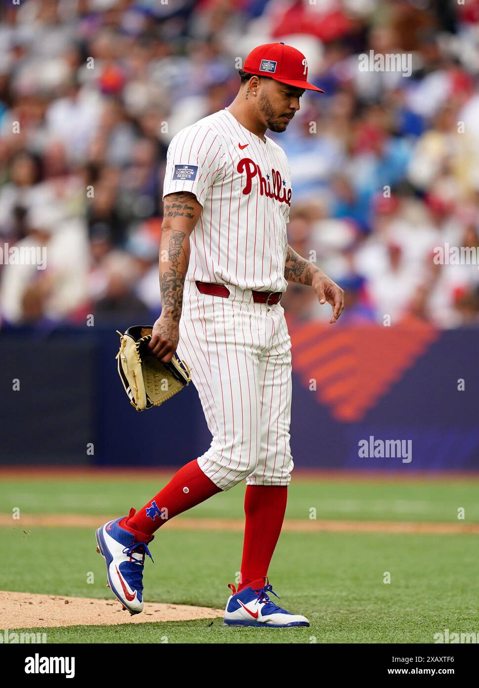 Philadelphia Phillies' Taijuan Walker leaves the field following a pitching change during game ...