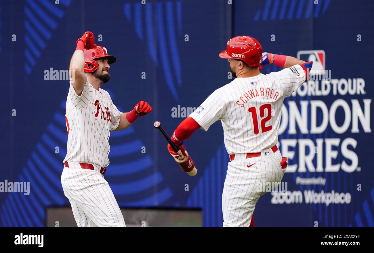 Philadelphia Phillies' David Dahl (left) celebrates with Kyle Schwarber ...