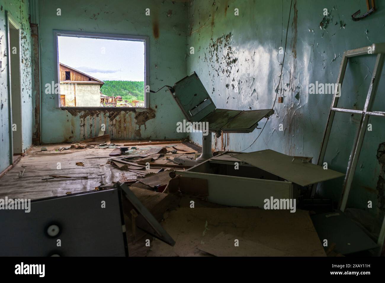 Interior of an abandoned destroyed hospital Stock Photo - Alamy