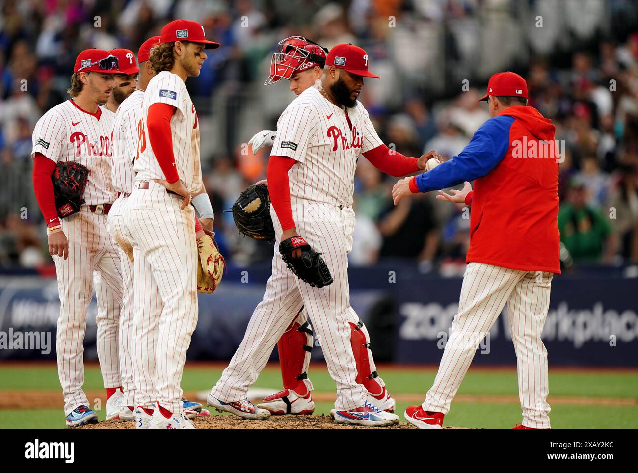 Philadelphia Phillies' pitcher Jose Alvarado (second right) leaves the ...