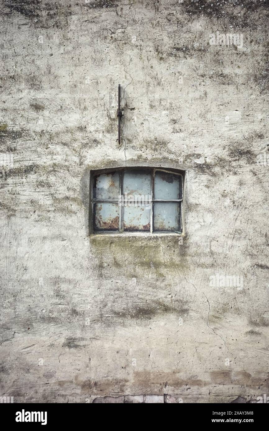 Small window in an old concrete wall Stock Photo - Alamy