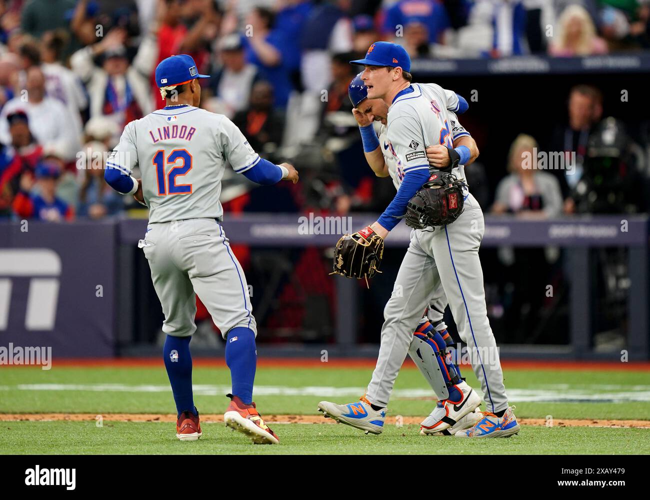 New York Mets' catcher Luis Torrens (rear, right) is congratulated by ...