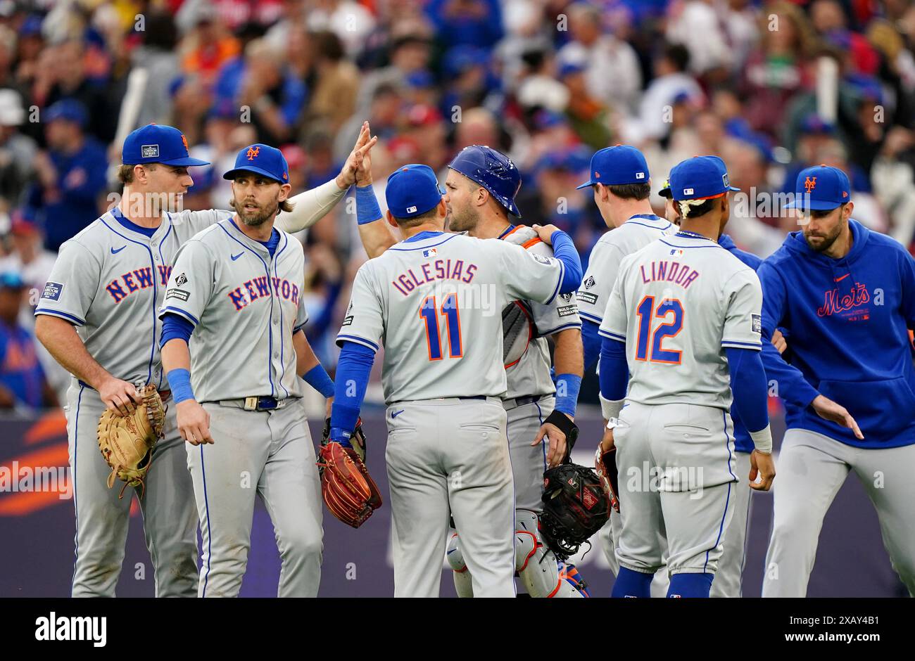 New York Mets' catcher Luis Torrens (centre, rear) is congratulated by ...