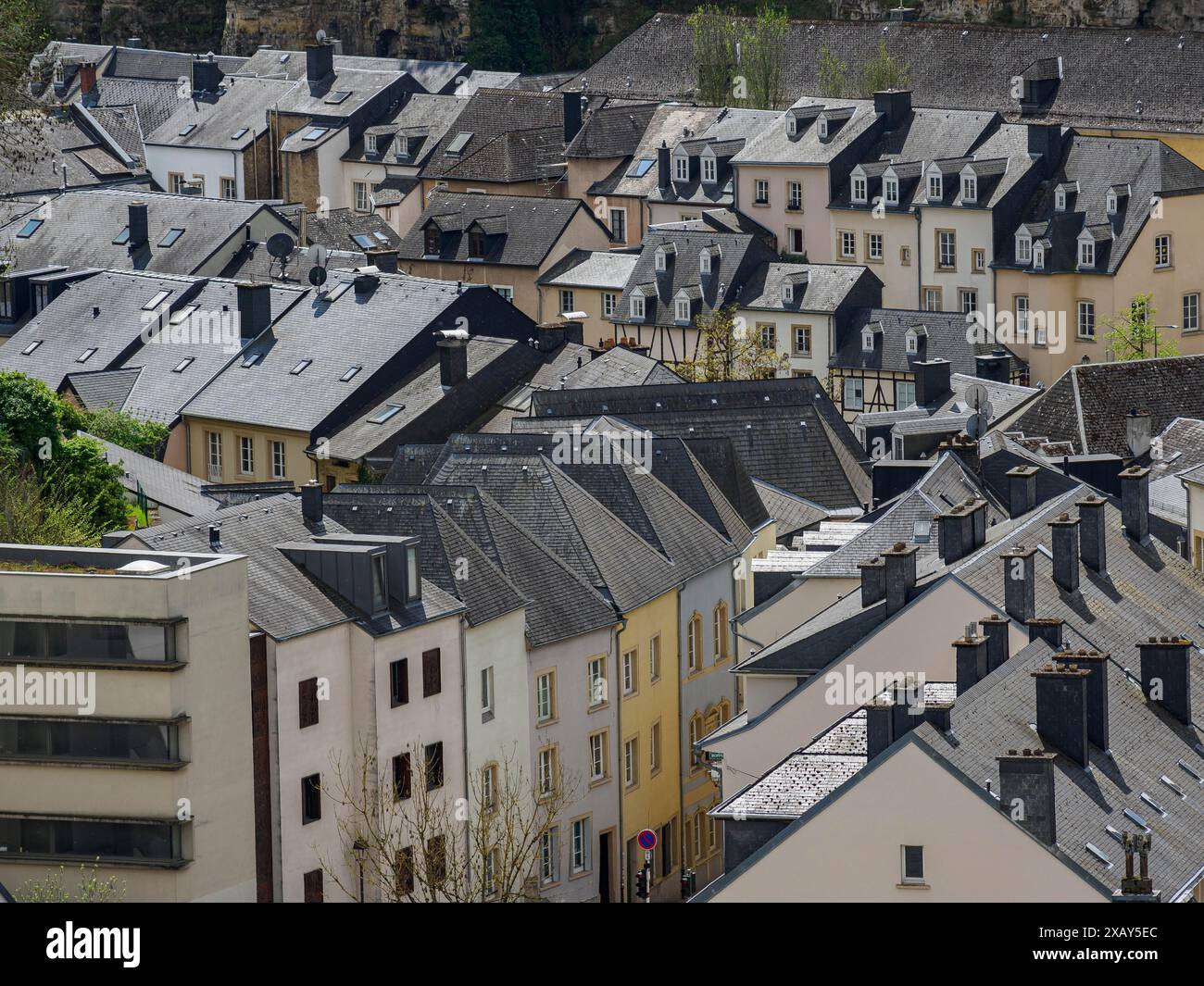 An urban scene with closely built houses and slate roofs, Luxembourg ...